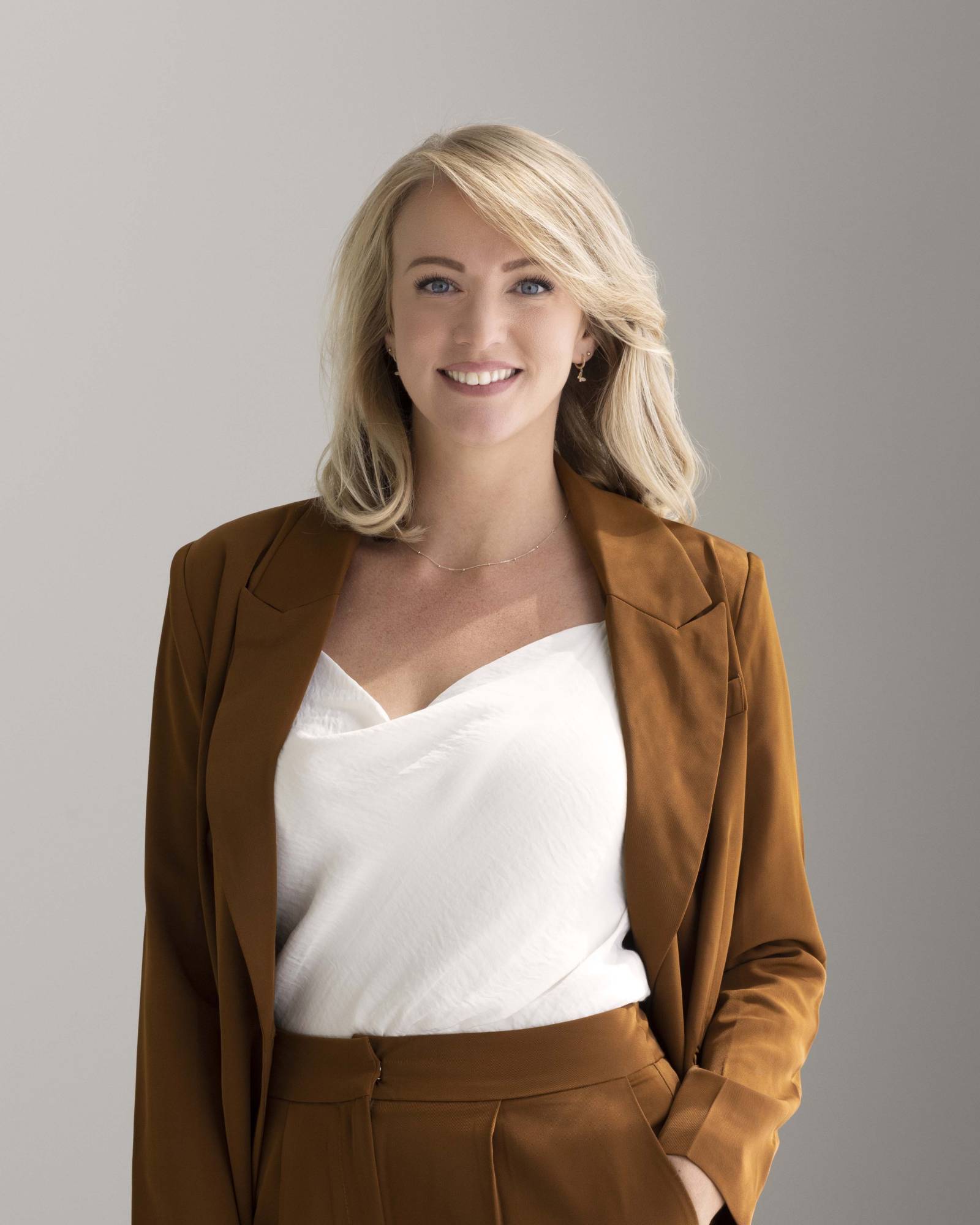 Luci Smart - John Reid Real Estate